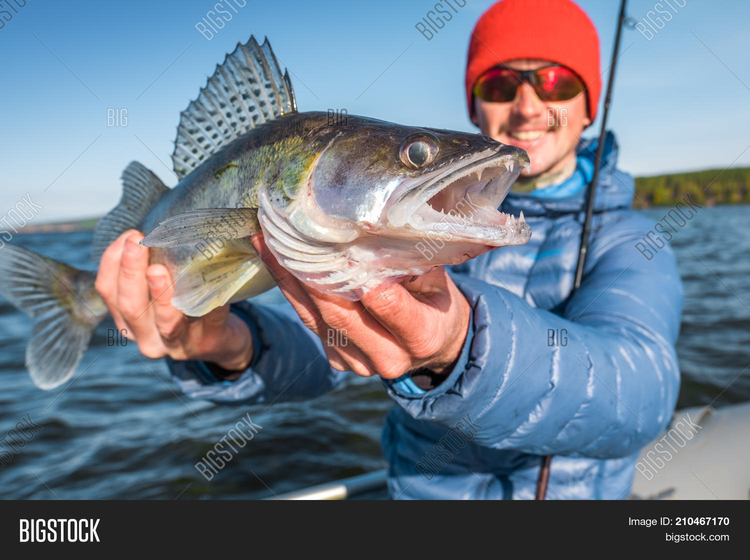 Happy Angler Holds Image & Photo (Free Trial) | Bigstock