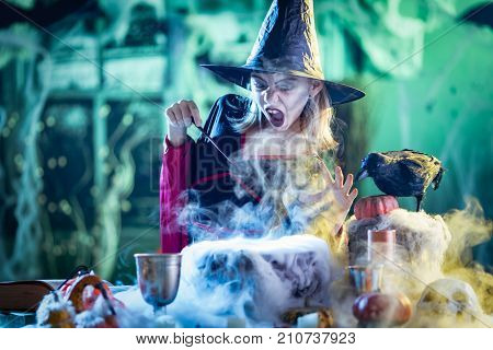 Young Witch Cooking Image & Photo (Free Trial) | Bigstock