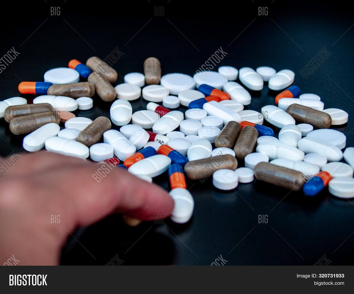 Person Holding Pills Image & Photo (Free Trial) | Bigstock