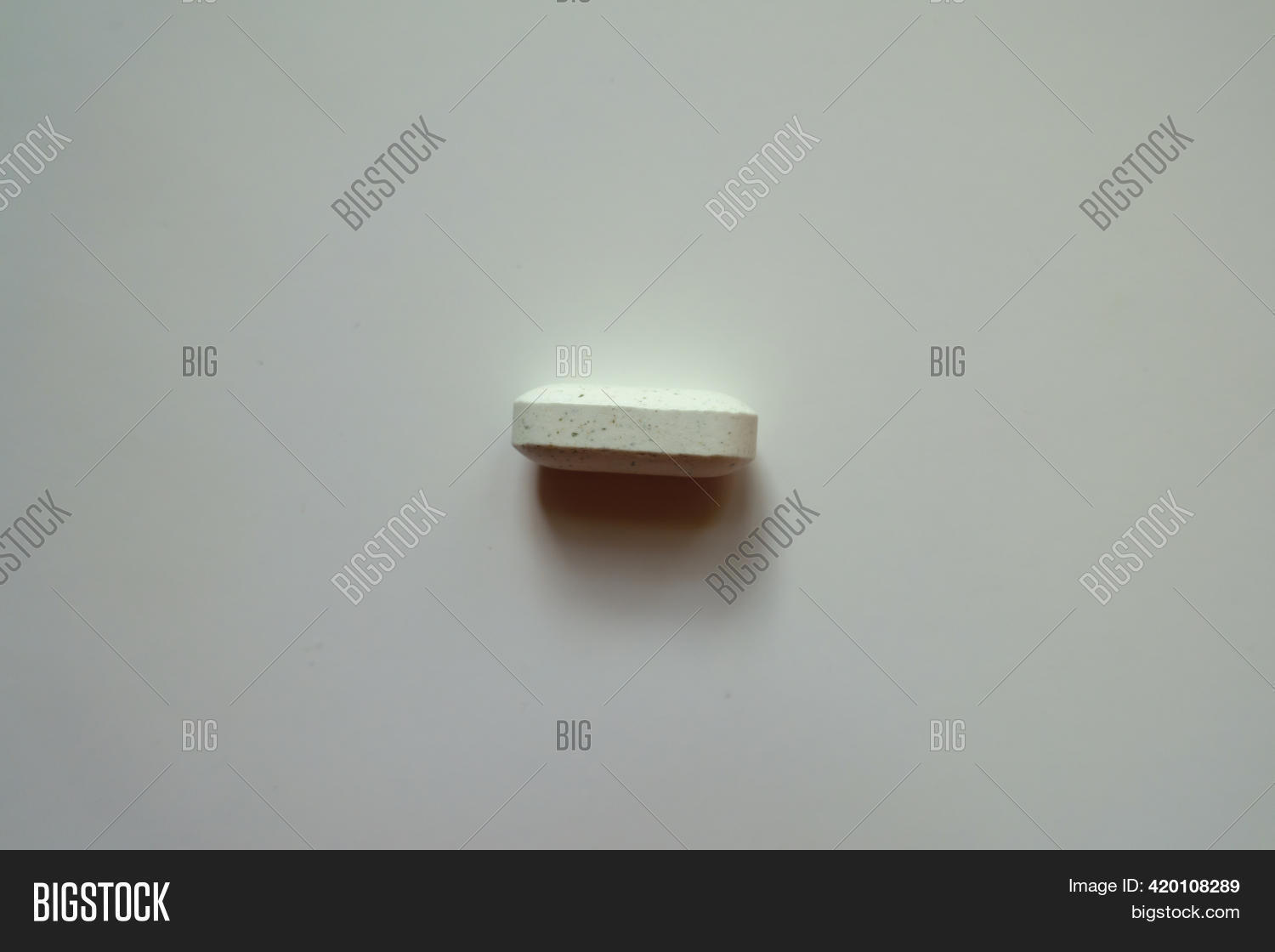 Single White Caplet Image & Photo (Free Trial) | Bigstock