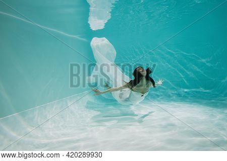 Woman Diving Into Water Images, Illustrations & Vectors (Free) - Bigstock