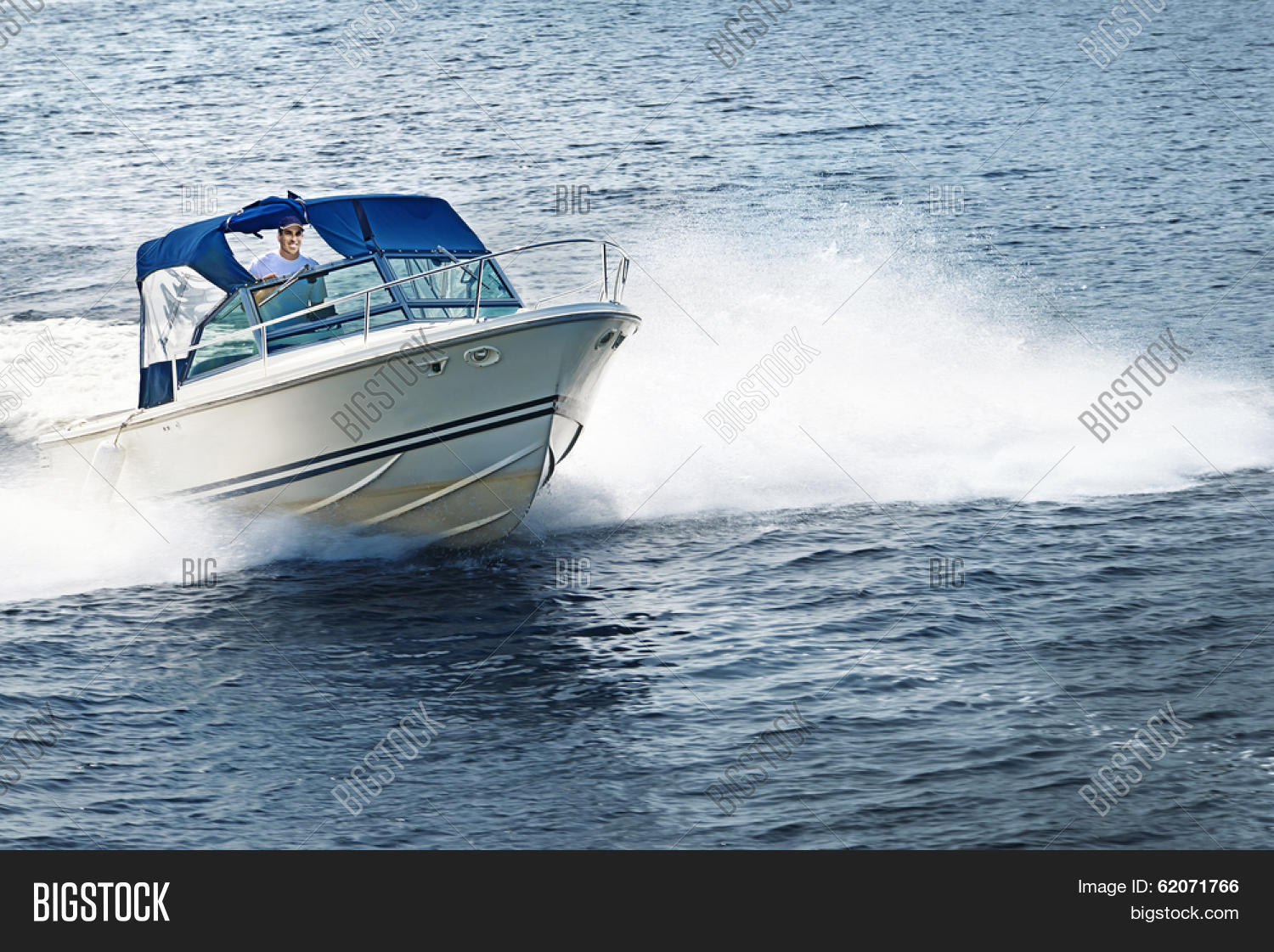 Man Piloting Motorboat Image & Photo (Free Trial) | Bigstock