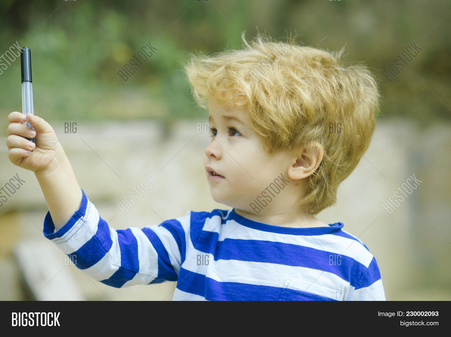 Boy Holds Plays Pen Image & Photo (Free Trial) | Bigstock