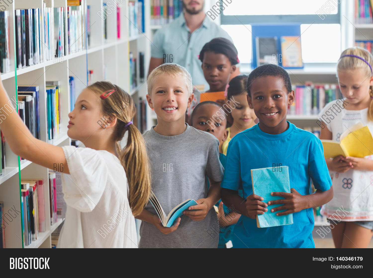 Girl Removing Book Image & Photo (Free Trial) | Bigstock