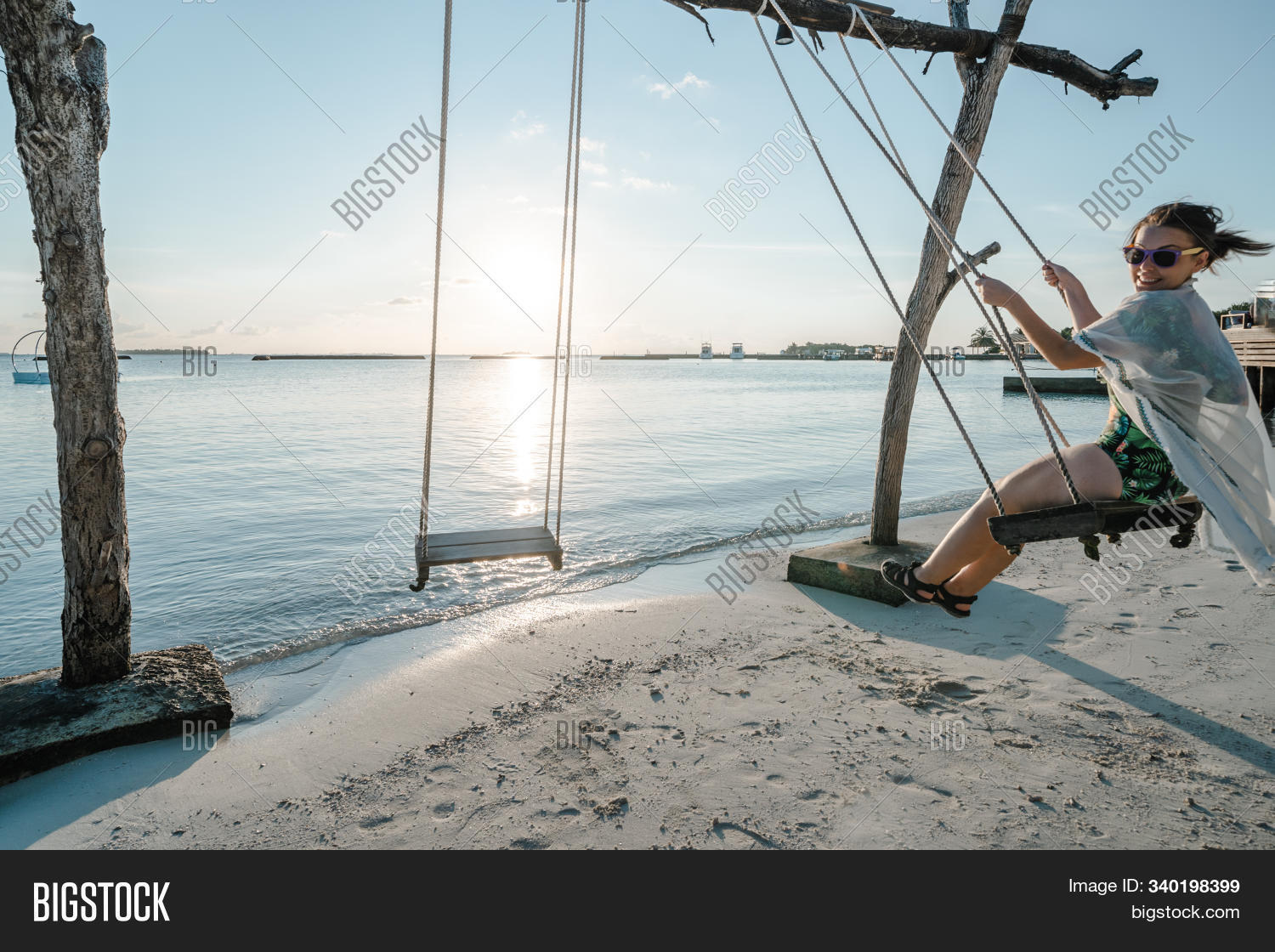 Woman Uses Beach Swing Image & Photo (Free Trial) | Bigstock