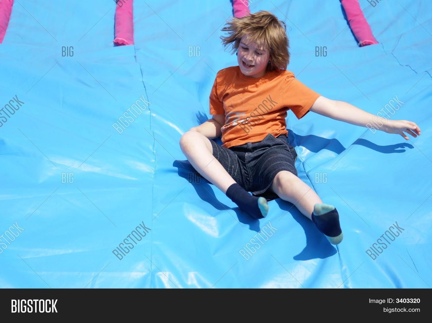 Child Playing On Slide Image & Photo (Free Trial) | Bigstock