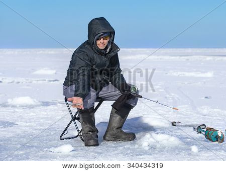 Man Ice Fishing On Image & Photo (Free Trial) | Bigstock