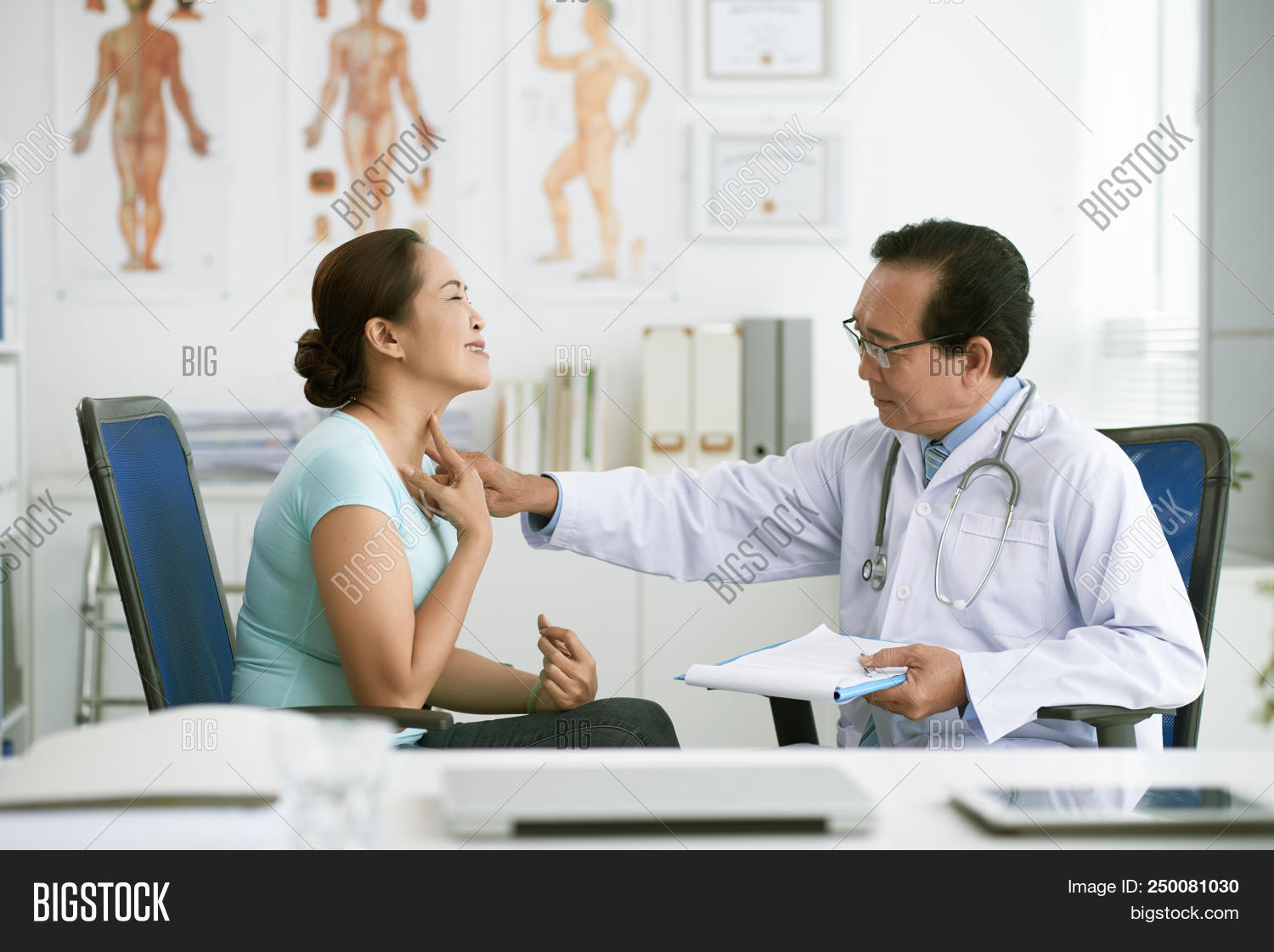 Doctor Palpating Image & Photo (Free Trial) | Bigstock