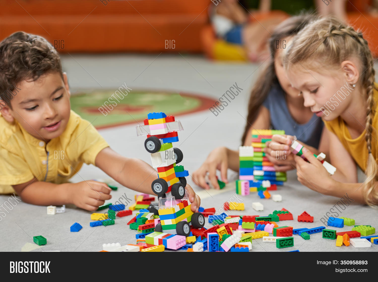 Preschoolers Playing With Blocks