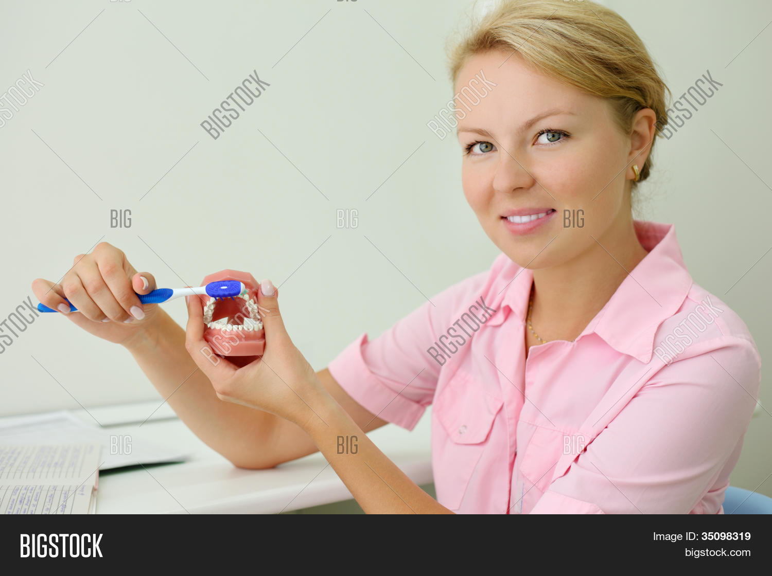 Smiling Dentist Shows Image & Photo (Free Trial) | Bigstock