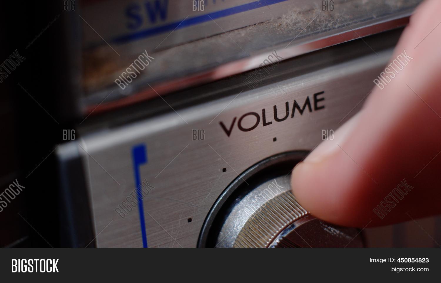 Hand Turns Volume Image & Photo (Free Trial) | Bigstock
