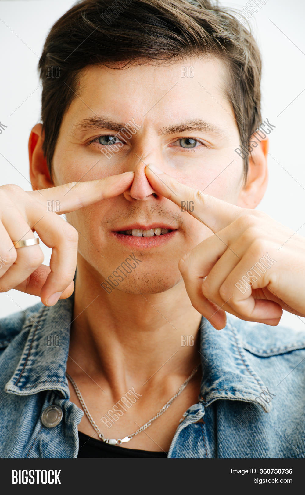 Man Shifting Nose Side Image & Photo (Free Trial) | Bigstock