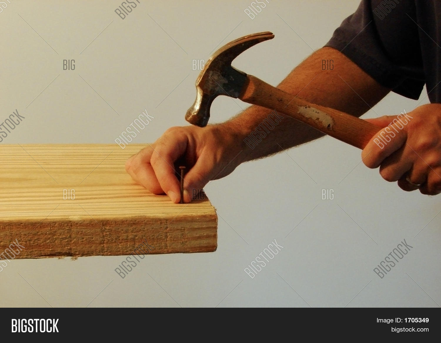 Man Hammering Nail Image & Photo (Free Trial) | Bigstock