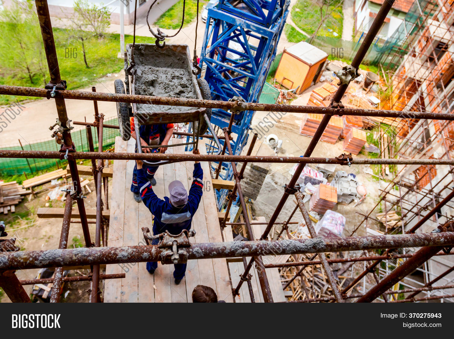 Workers Waiting Crane Image & Photo (Free Trial) | Bigstock