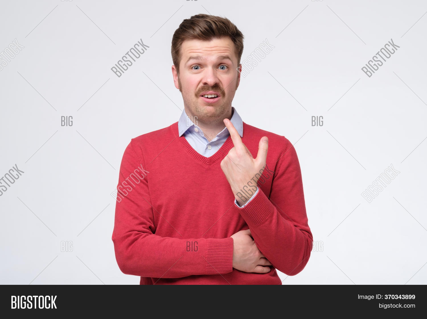 Puzzled Man Indicates Image & Photo (Free Trial) | Bigstock
