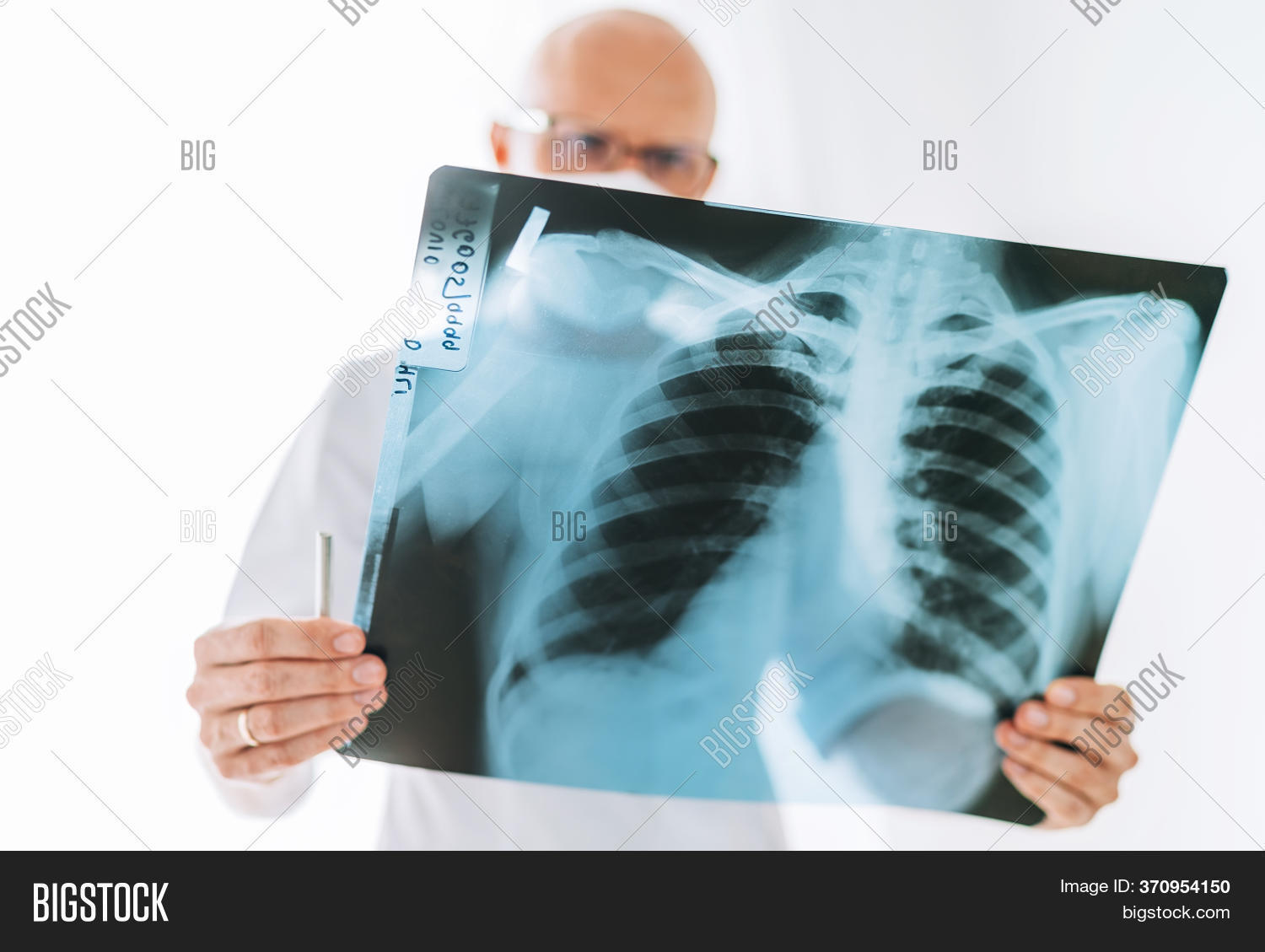 Male Doctor Examining Image & Photo (Free Trial) | Bigstock