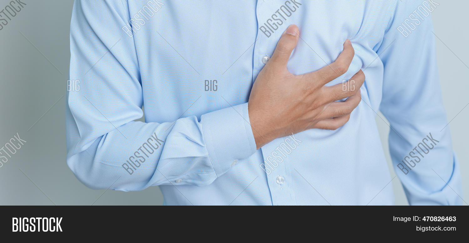 Man Hand Holding Chest Image & Photo (Free Trial) | Bigstock