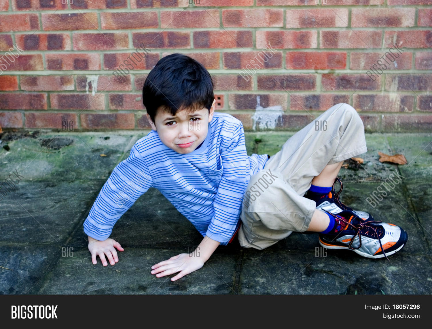 Young Boy Slips Over Image & Photo (Free Trial) | Bigstock