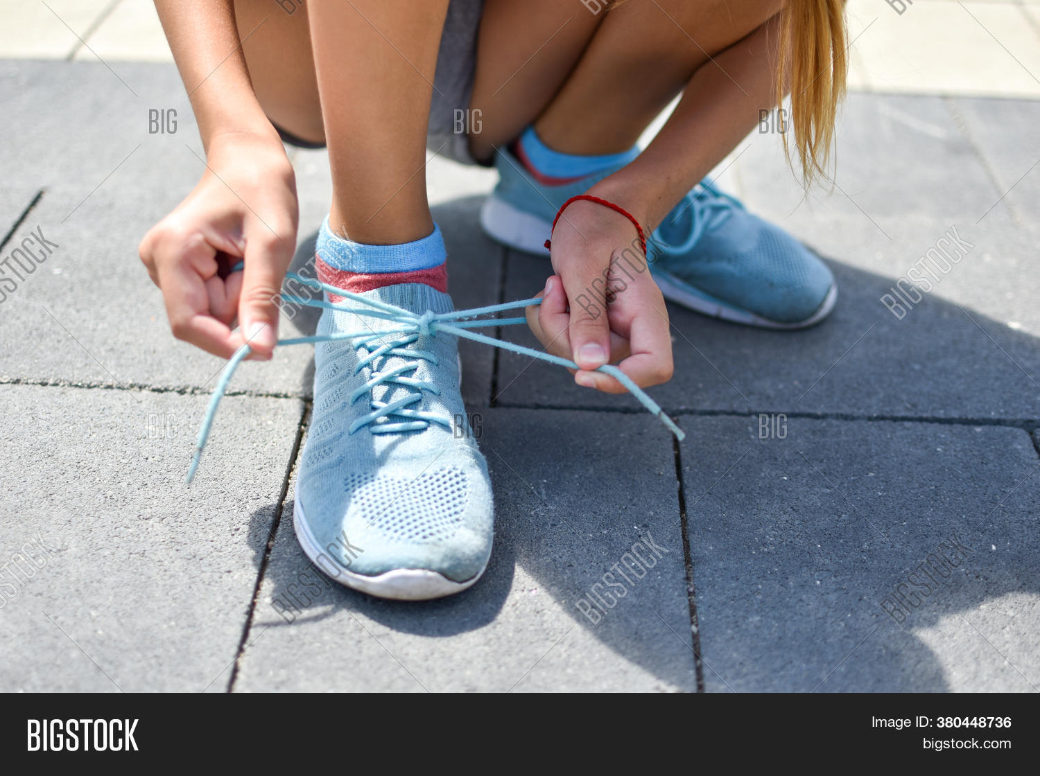 Girl Tying Laces On Image & Photo (Free Trial) | Bigstock