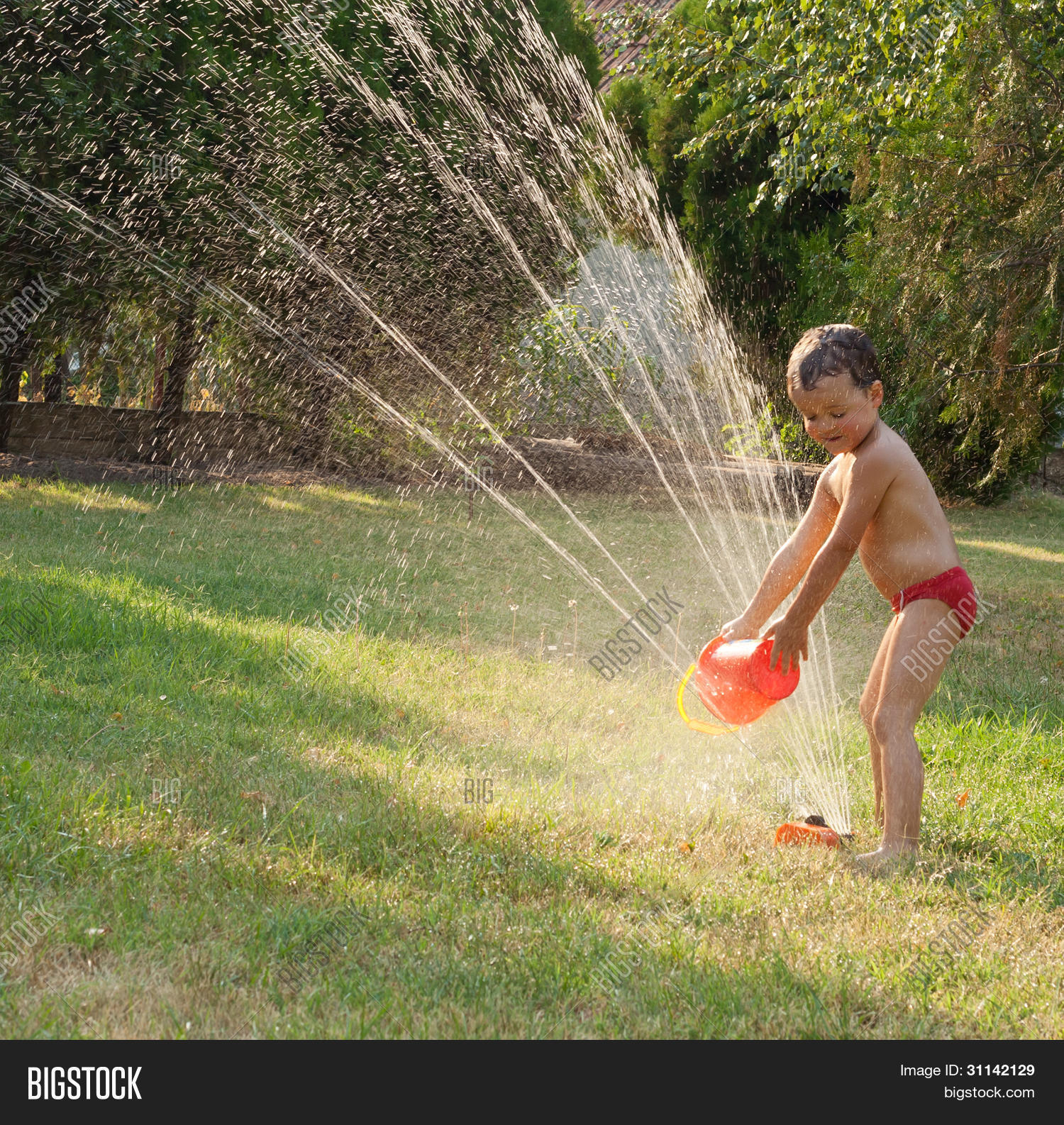 Water Sprinkler Fun Image & Photo (Free Trial) | Bigstock