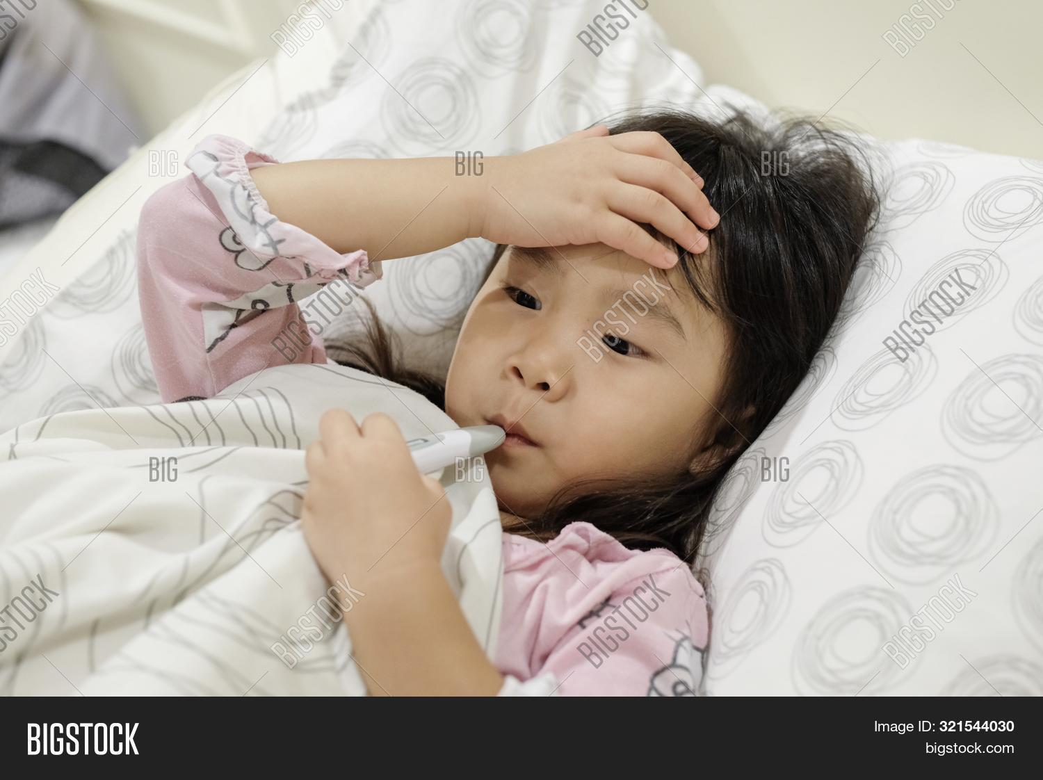 Asian Child Girl Sick Image & Photo (Free Trial) | Bigstock