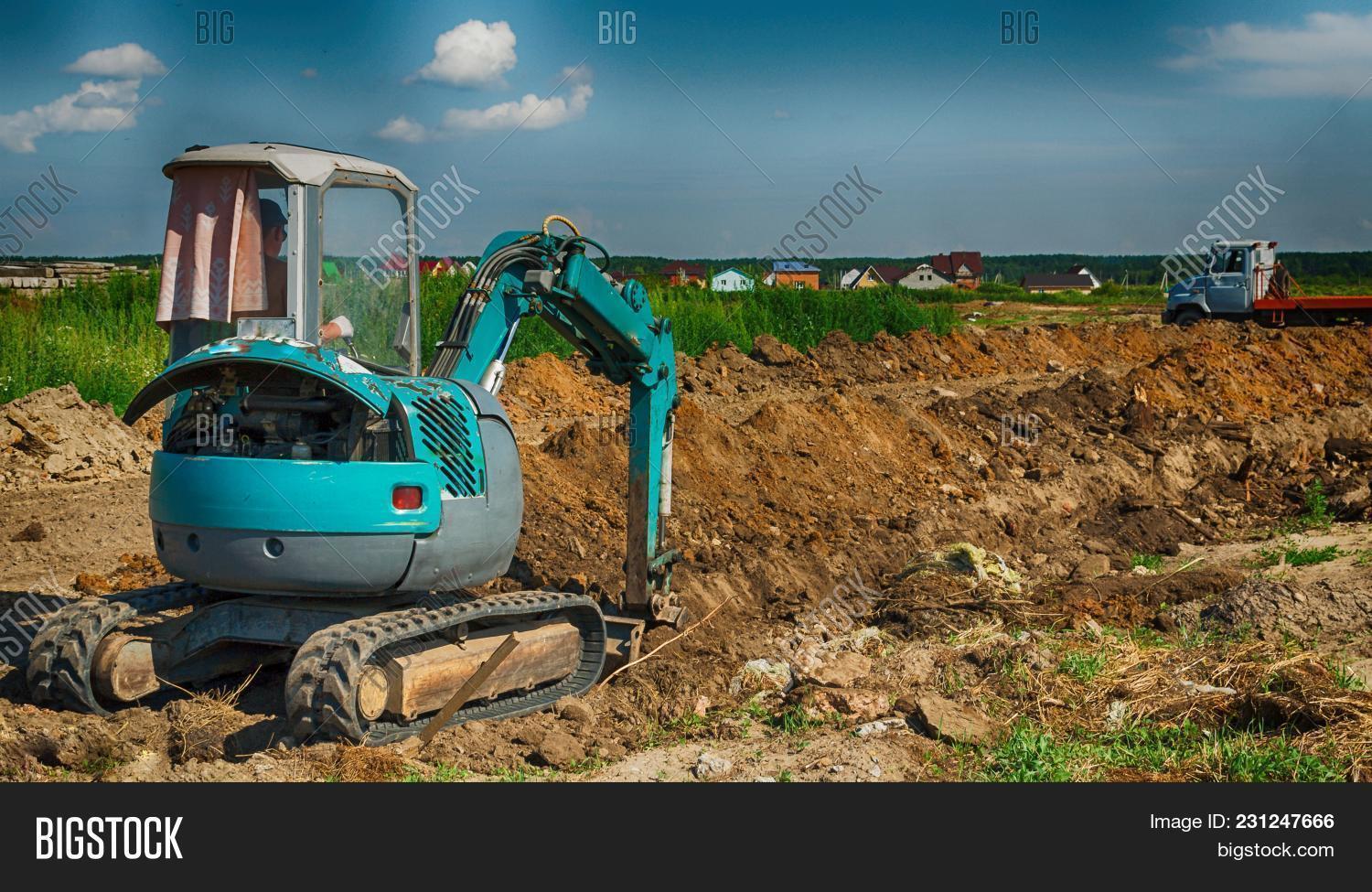 Excavator Field Russia Image & Photo (Free Trial) | Bigstock