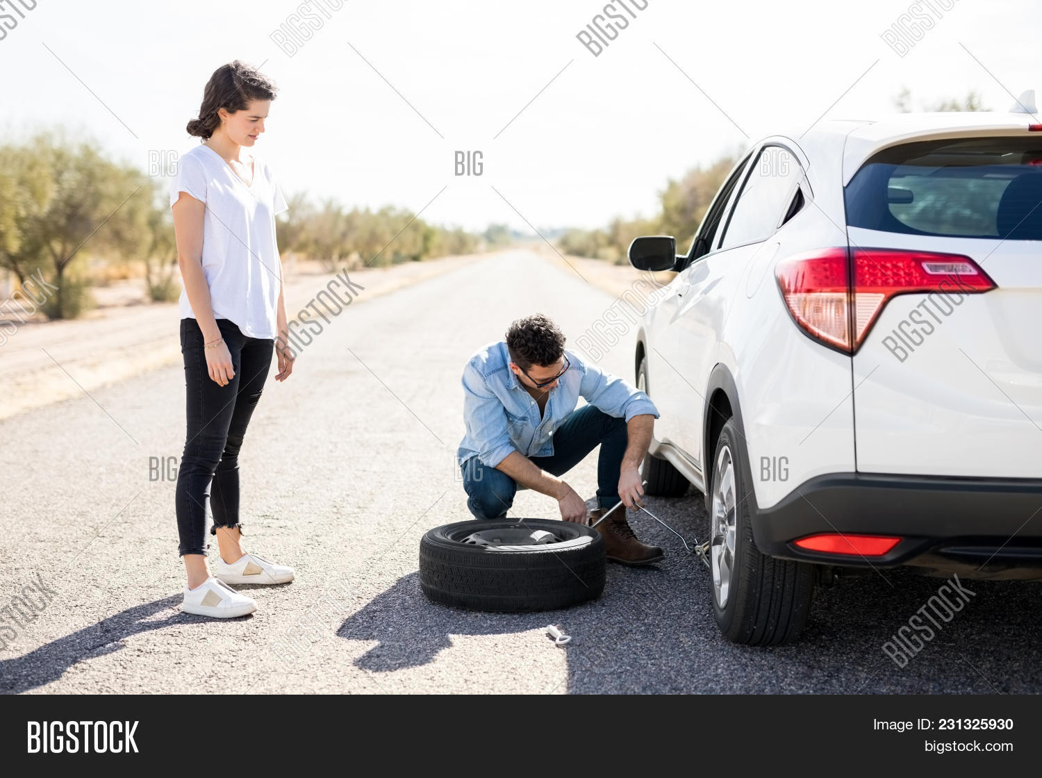 Young Guy Lifting Car Image & Photo (Free Trial) | Bigstock
