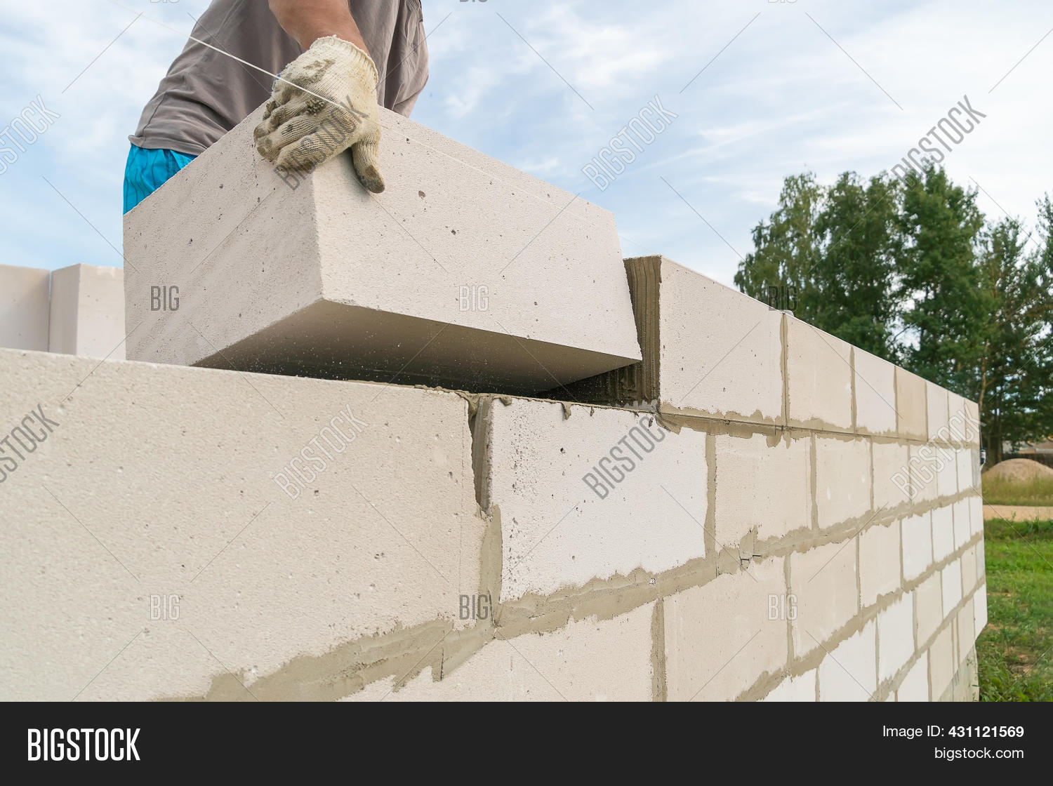 Builder Builds Image & Photo (Free Trial) | Bigstock