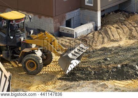 Bulldozer Bucket Dumps Image & Photo (Free Trial) | Bigstock