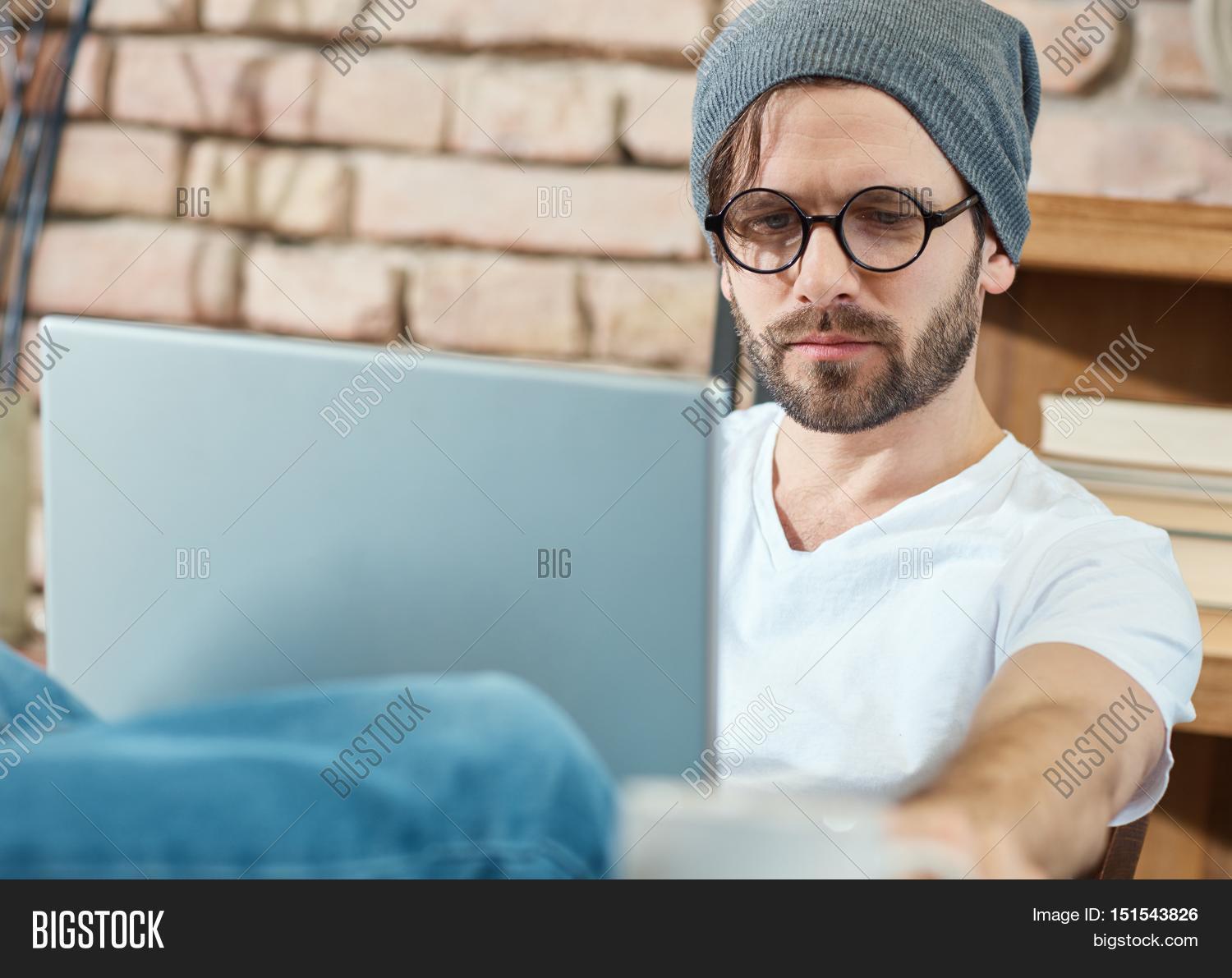 Young Man Using Laptop Image & Photo (Free Trial) | Bigstock