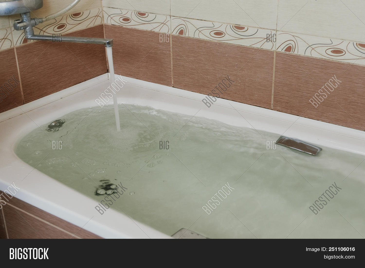 Water Poured Into Tub Image & Photo (Free Trial) | Bigstock