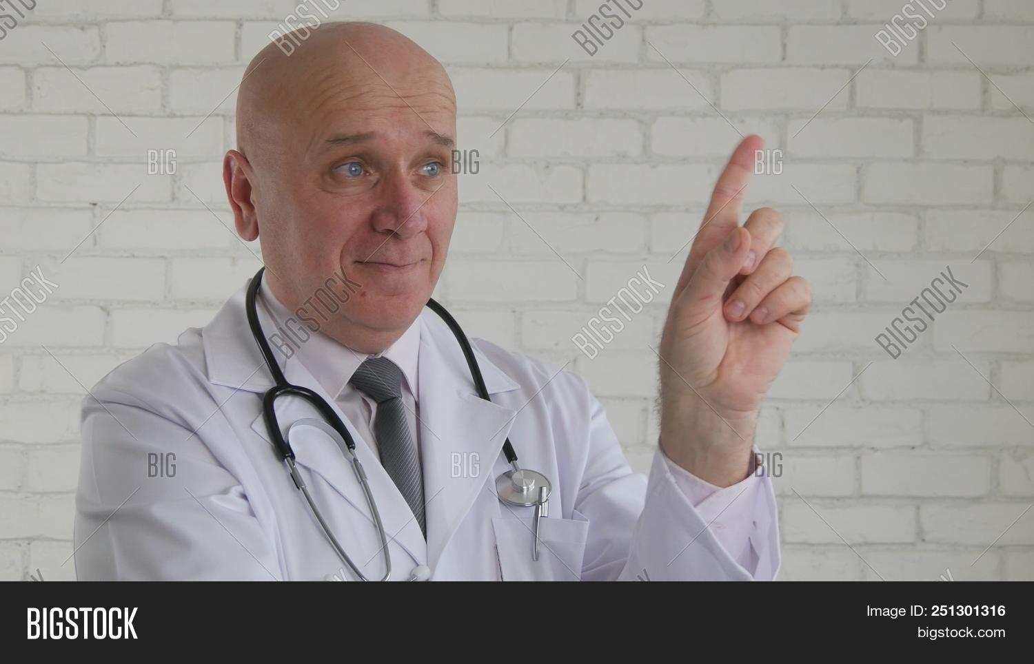 Doctor Image Doing Image & Photo (Free Trial) | Bigstock