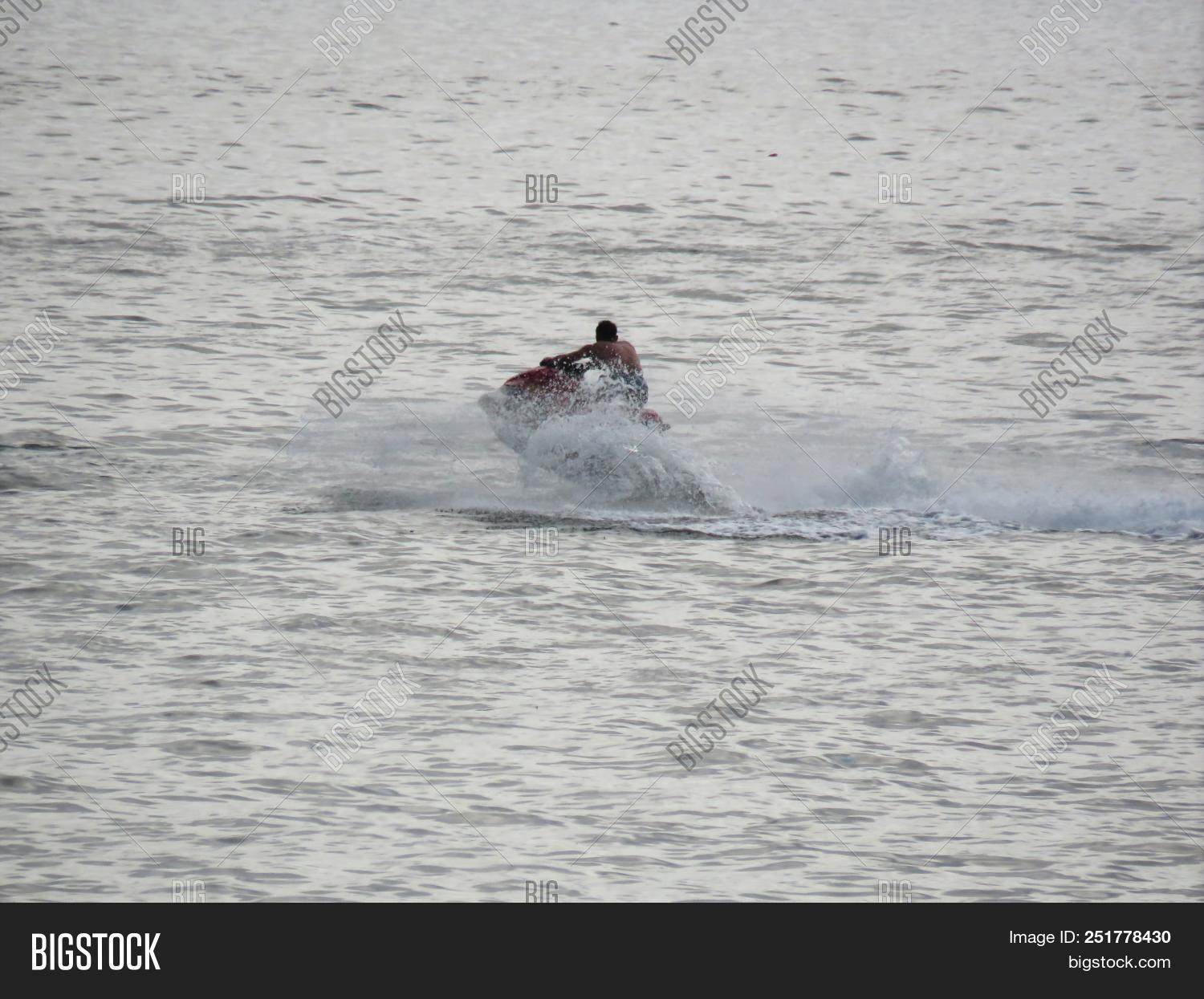Man Driving Jet Ski Image & Photo (Free Trial) | Bigstock