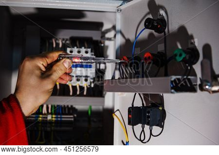 Checking The Electrical Voltage In The Junction Box. Power Measurement ...