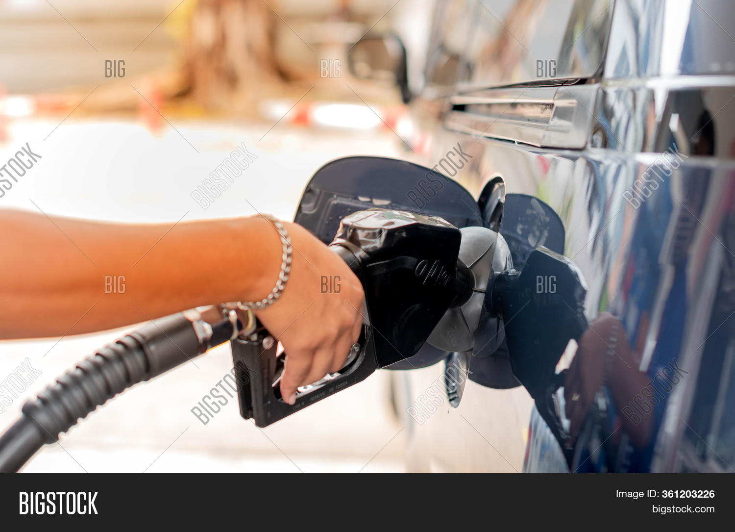 Male Hand Fill Petrol Image & Photo (Free Trial) | Bigstock