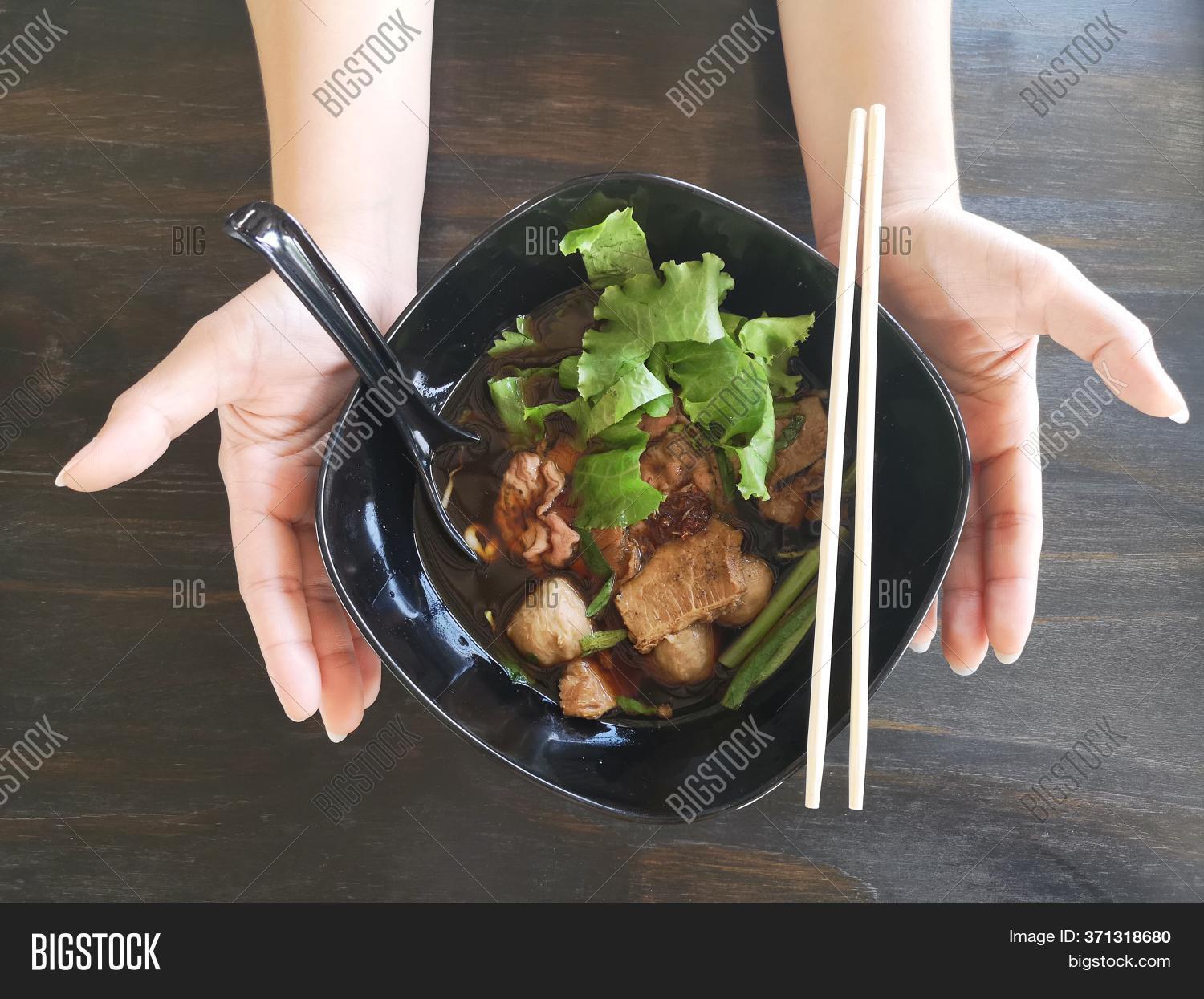 Two Hands Hold Black Image & Photo (Free Trial) | Bigstock