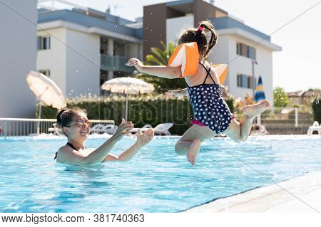 Child Jumping Swimming Image & Photo (Free Trial) | Bigstock