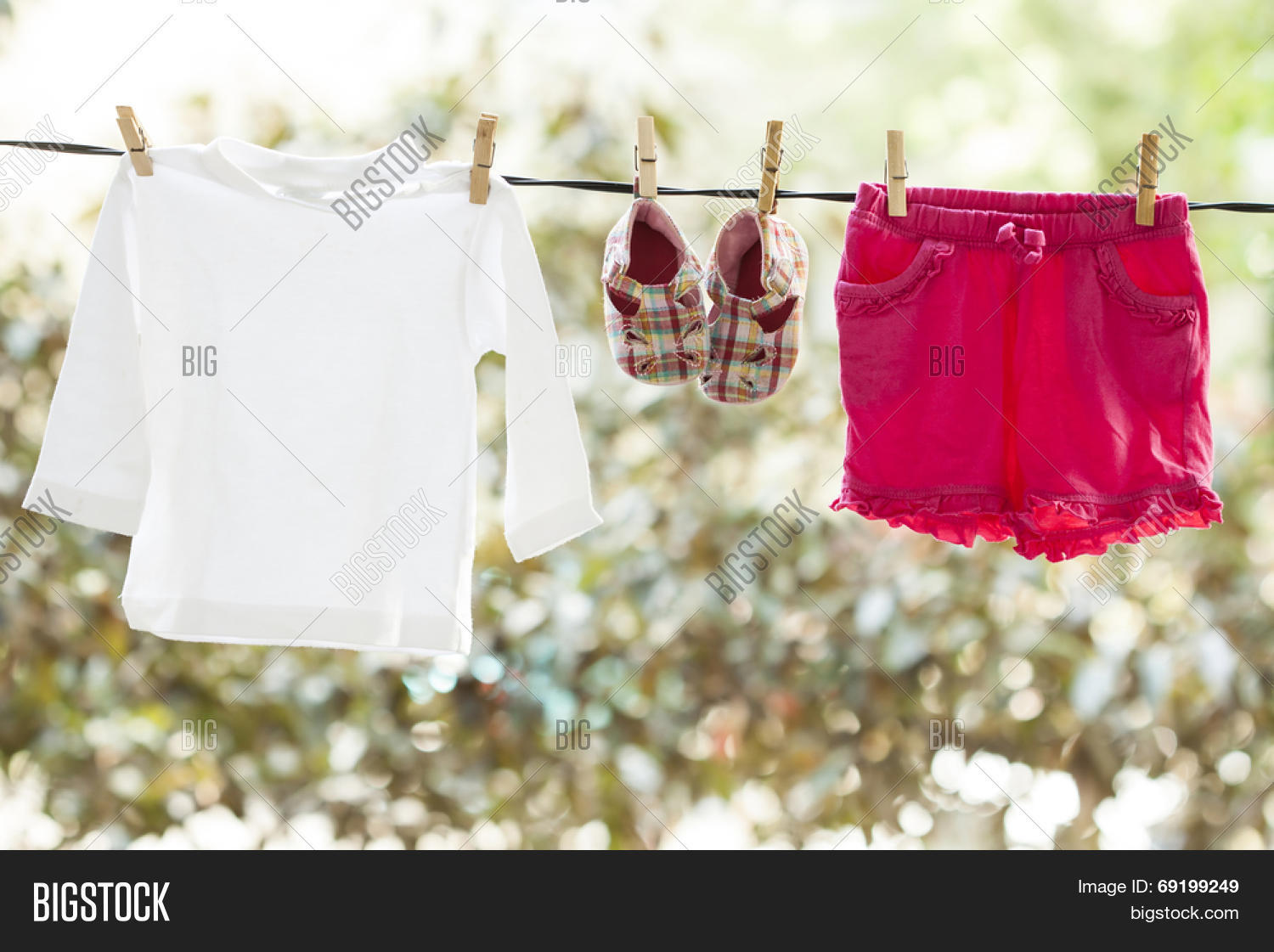 Baby Clothes Hanging Image & Photo (Free Trial) | Bigstock