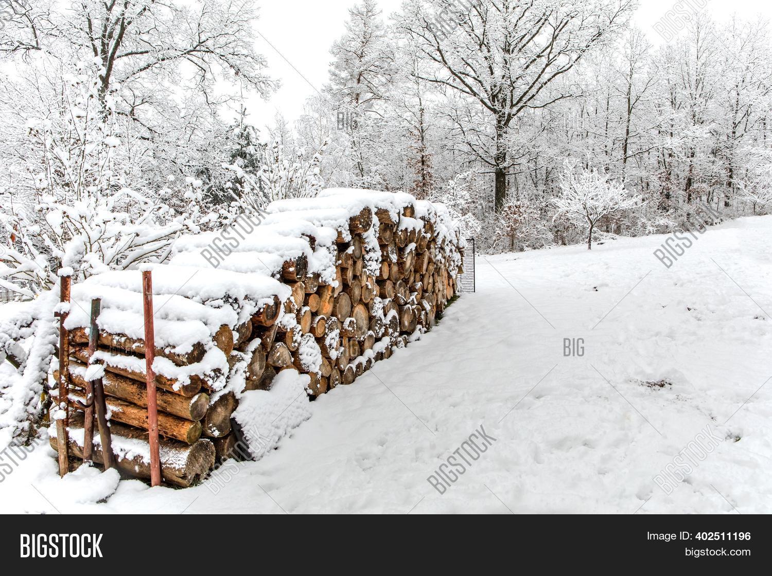 Snow Covered Firewood Image & Photo (Free Trial) | Bigstock