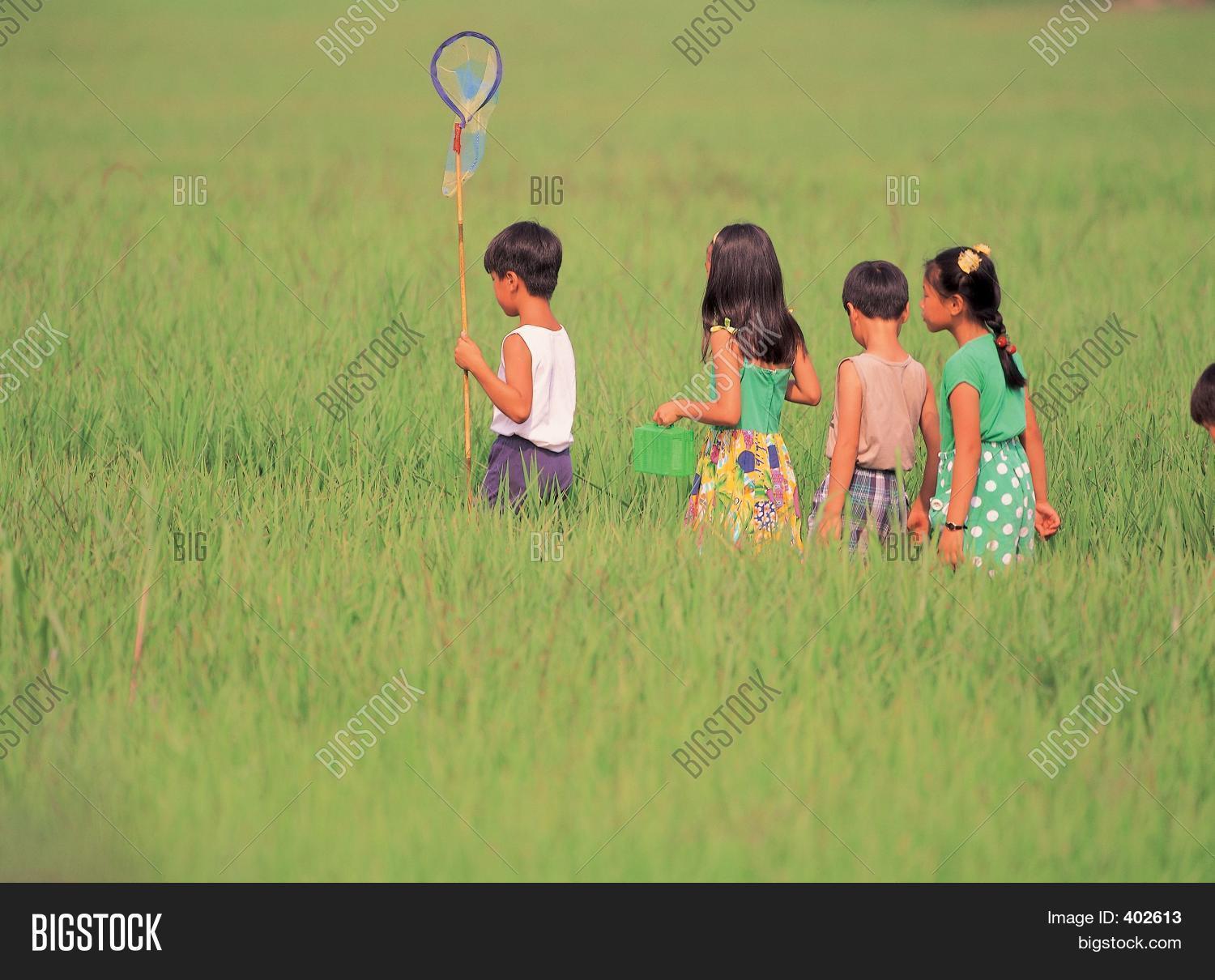 Kids On Grass Image & Photo (Free Trial) | Bigstock