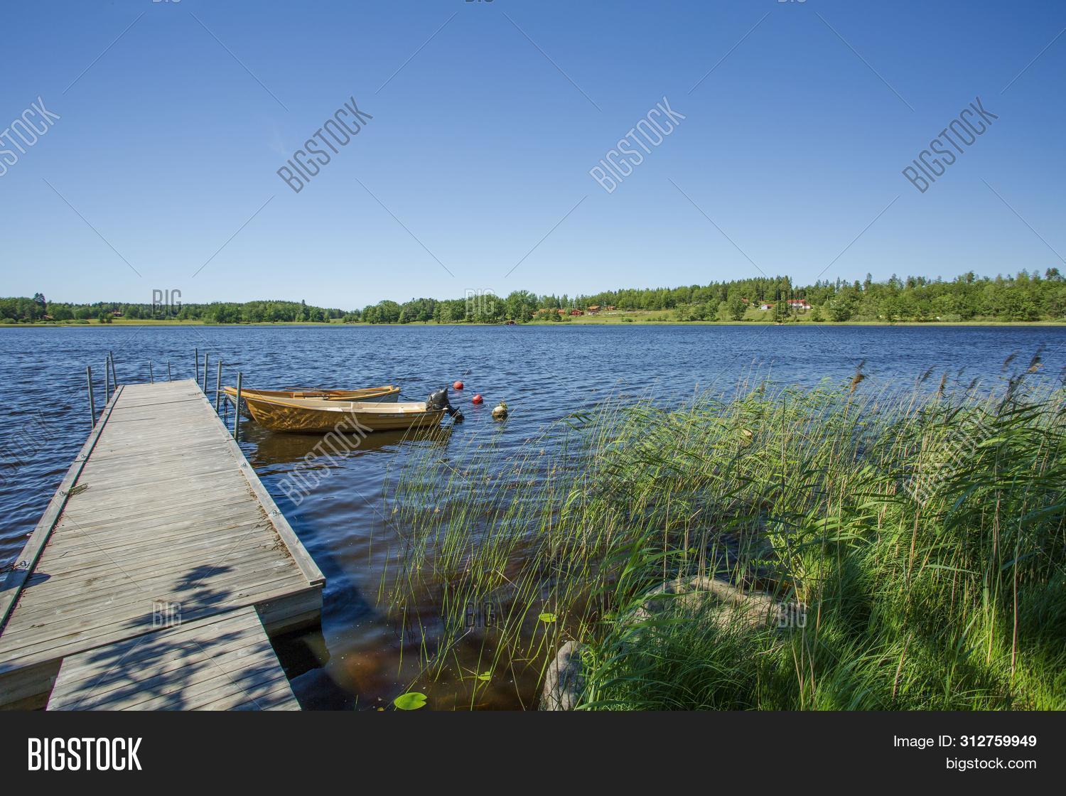 View Lake Two Boats Image & Photo (Free Trial) | Bigstock