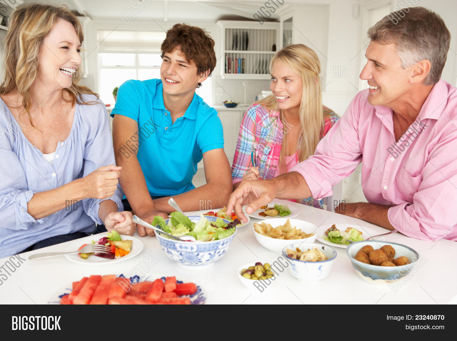 Family Enjoying Meal Image & Photo (Free Trial) | Bigstock