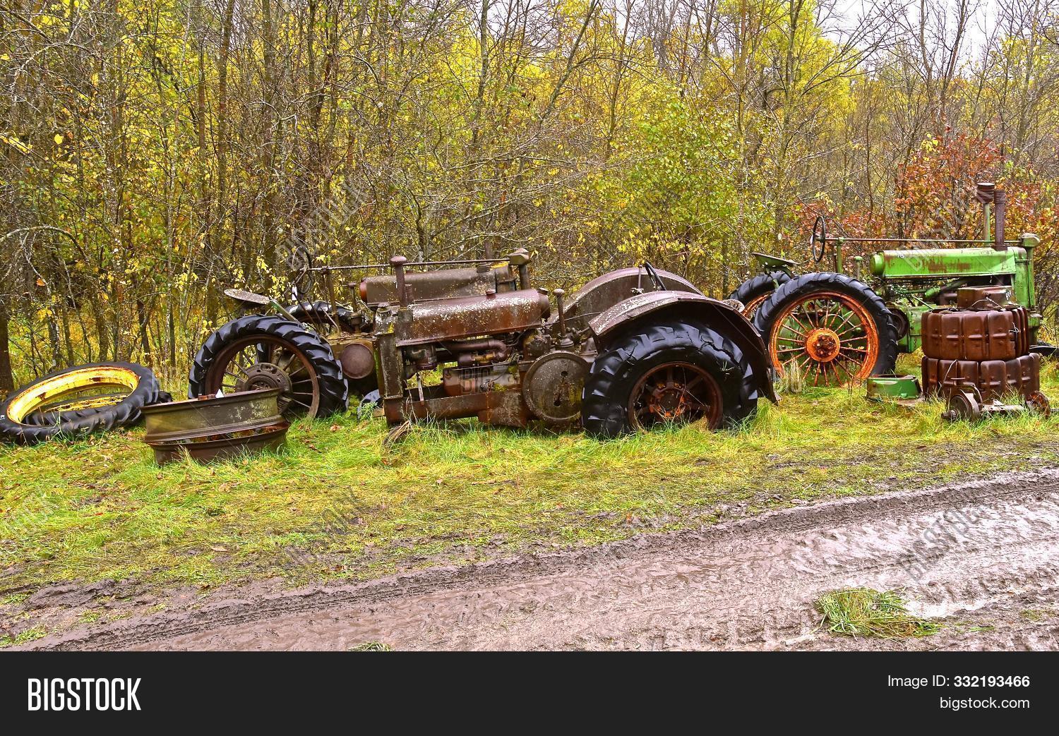 Old Discarded Tractors Image & Photo (Free Trial) | Bigstock