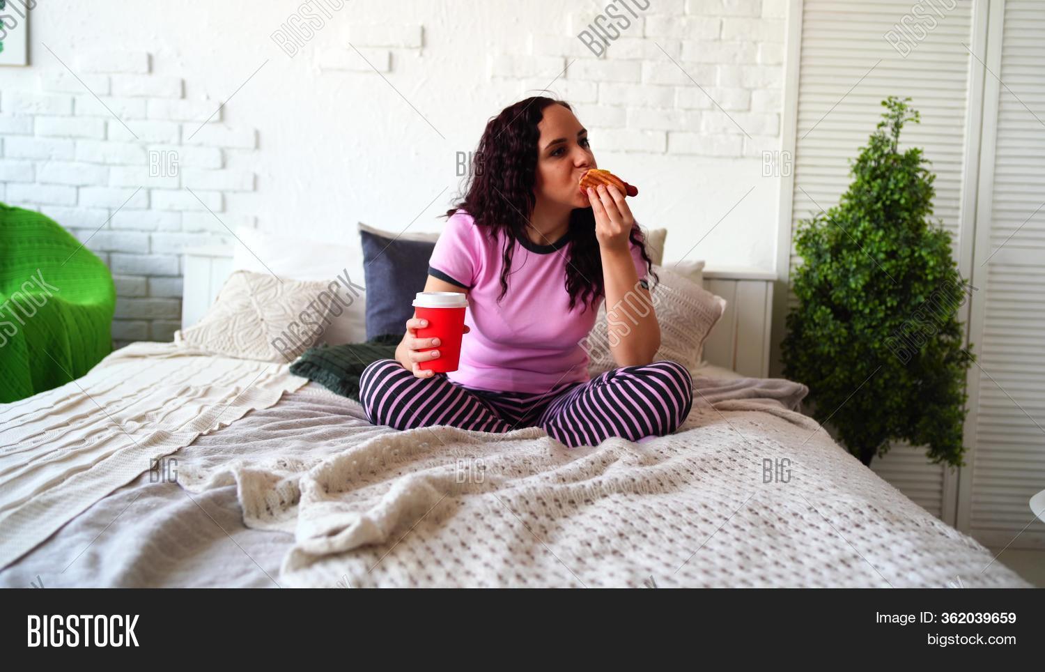 Young Woman Bed Eating Image & Photo (Free Trial) | Bigstock