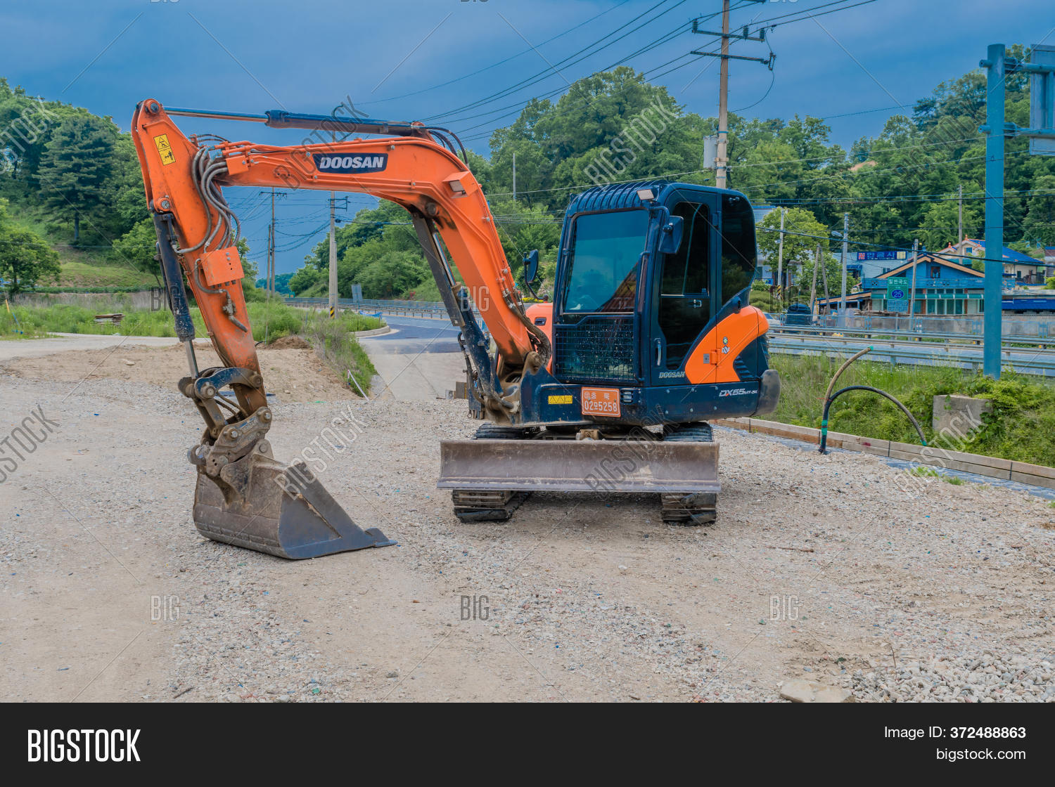 Backhoe Sitting Idle Image & Photo (Free Trial) | Bigstock