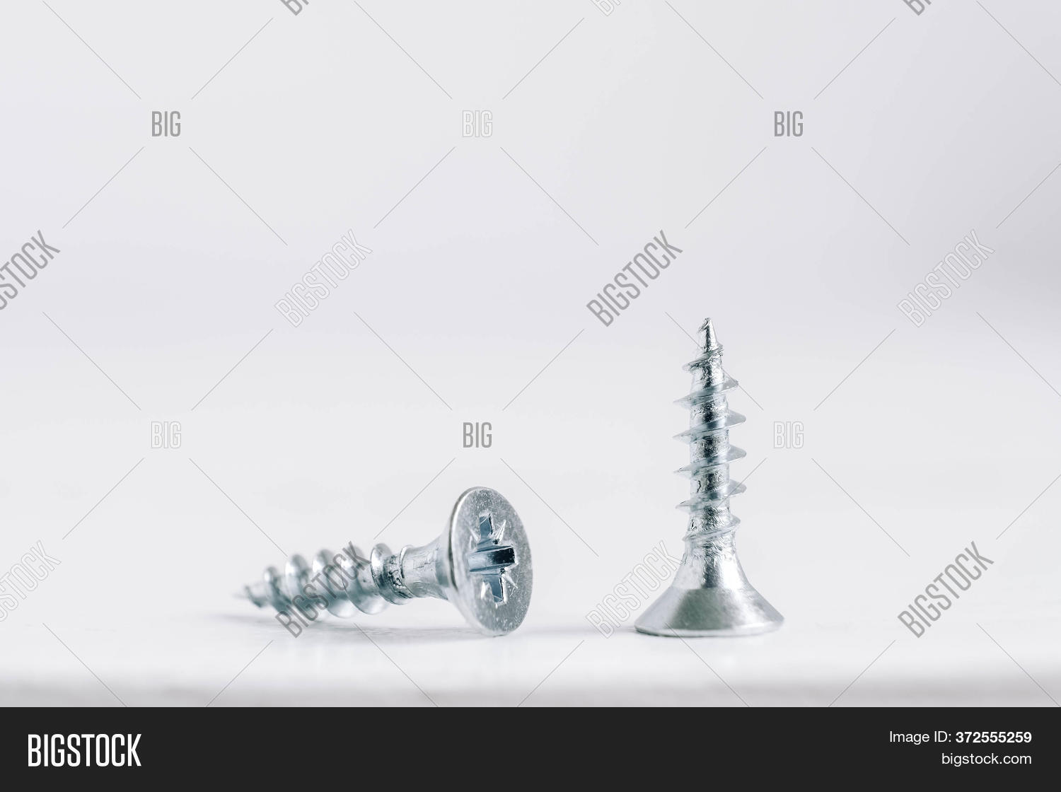 Two Metal Screws Wood Image & Photo (Free Trial) | Bigstock
