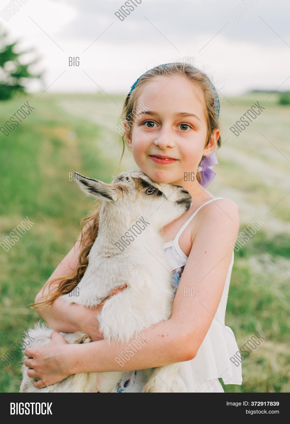 Girl Baby Goat On Farm Image & Photo (Free Trial) | Bigstock