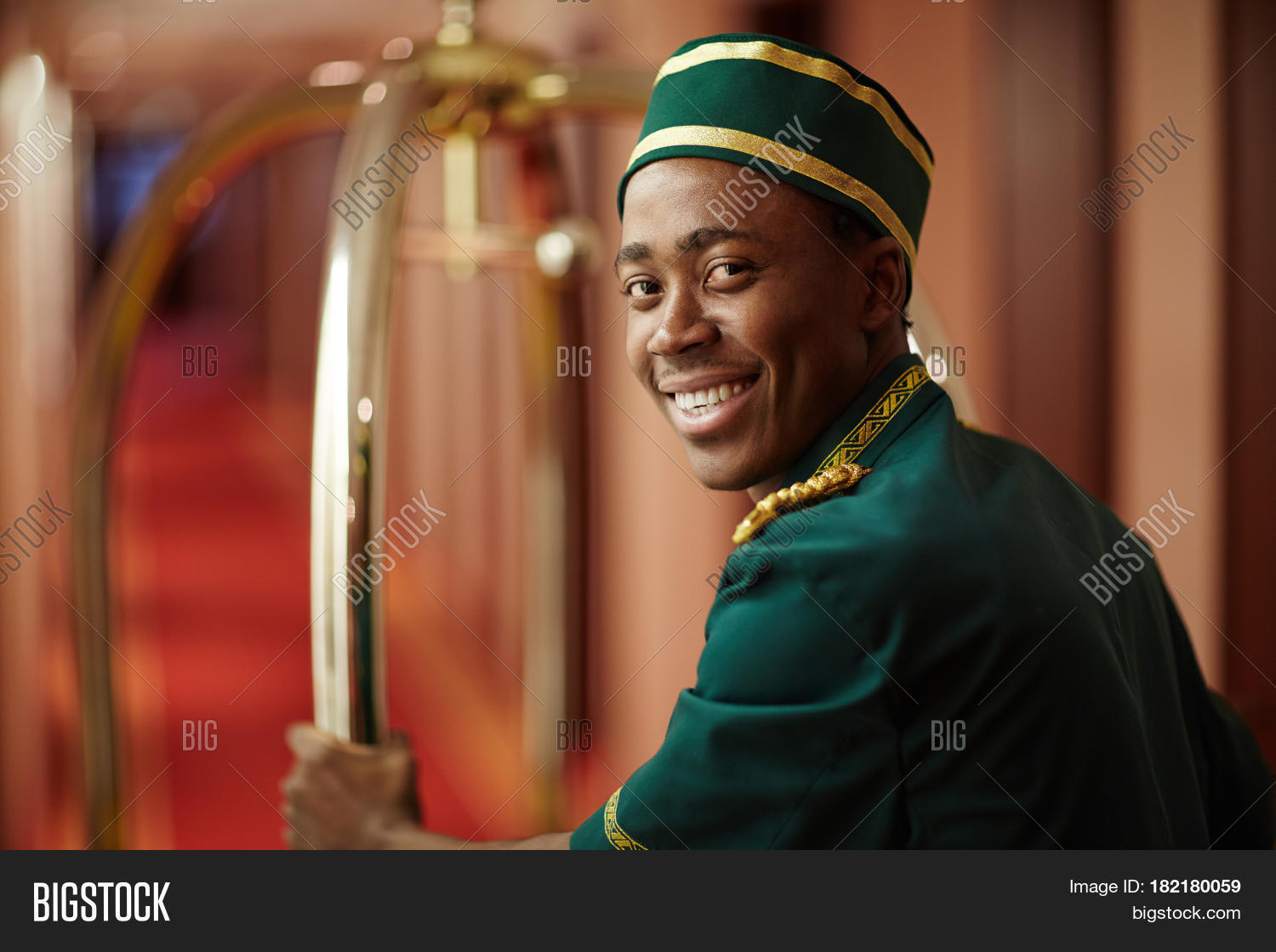 Smiley Young Bellboy Image & Photo (Free Trial) | Bigstock