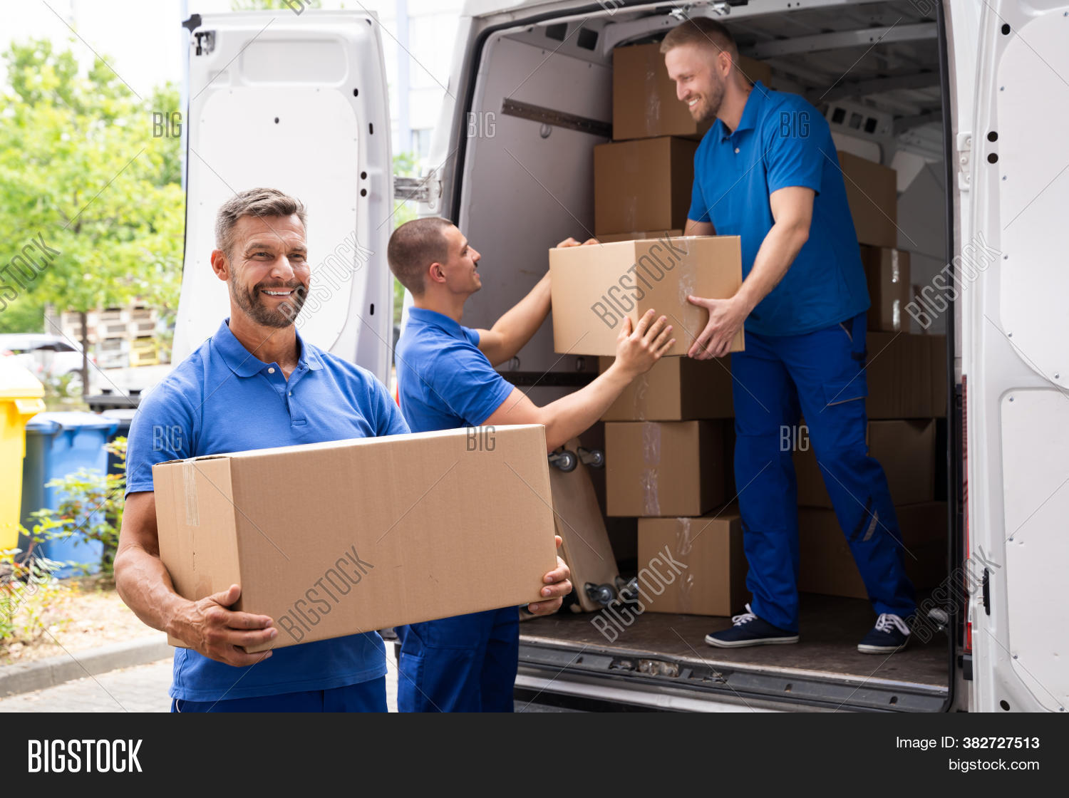Truck Movers Loading Image & Photo (Free Trial) | Bigstock