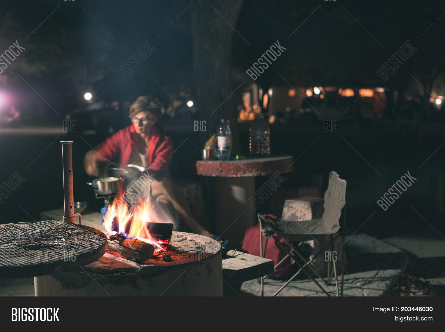 Woman Cooking Fire Image & Photo (Free Trial) | Bigstock